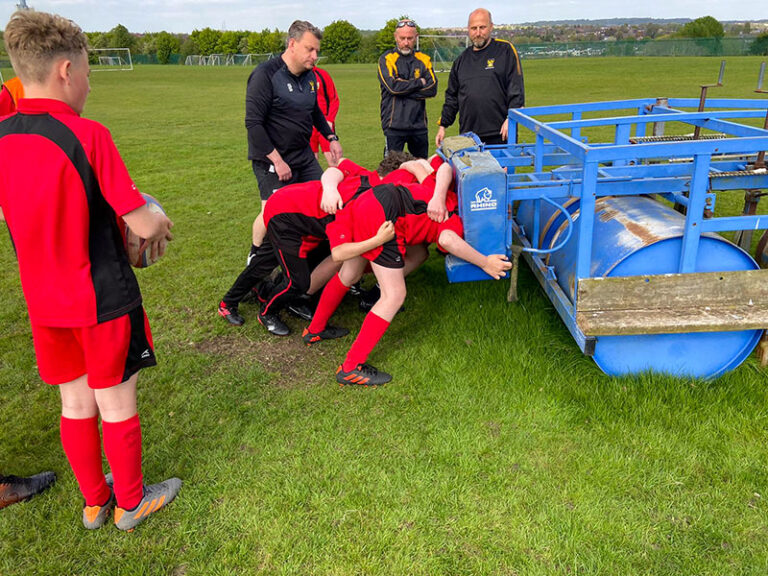 Students practising the scrum at a rugby taster session at the Longton ...